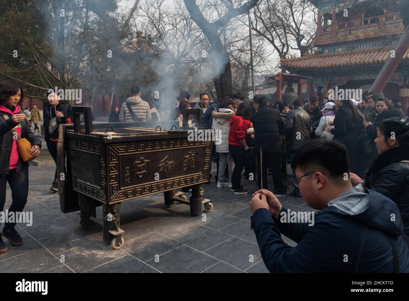 People praying at The Lama Temple Stock Photo - Alamy