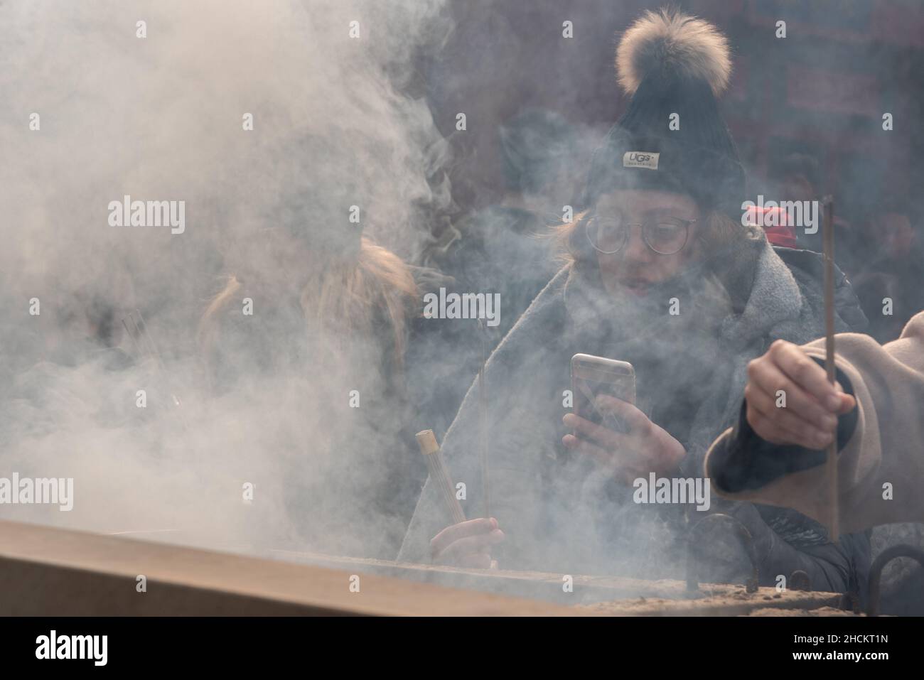 People praying at The Lama Temple Stock Photo - Alamy