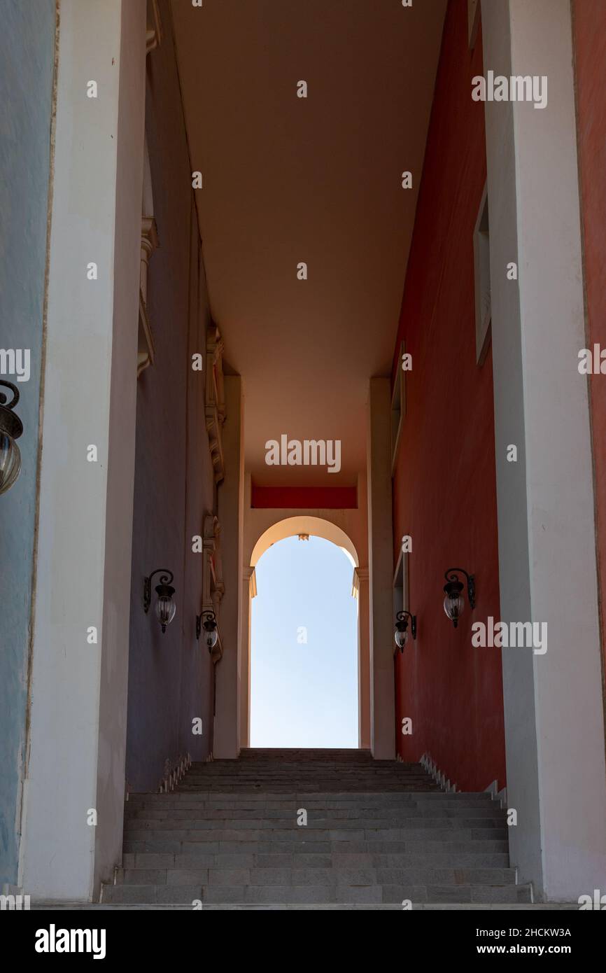 Beautiful view of a corridor leading to an opened arch in Pearl Qatar ...