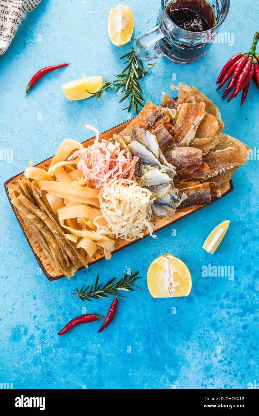 Dried Seafood Mix with Squid, Tuna, codfishon, yellow minke on Plate ...