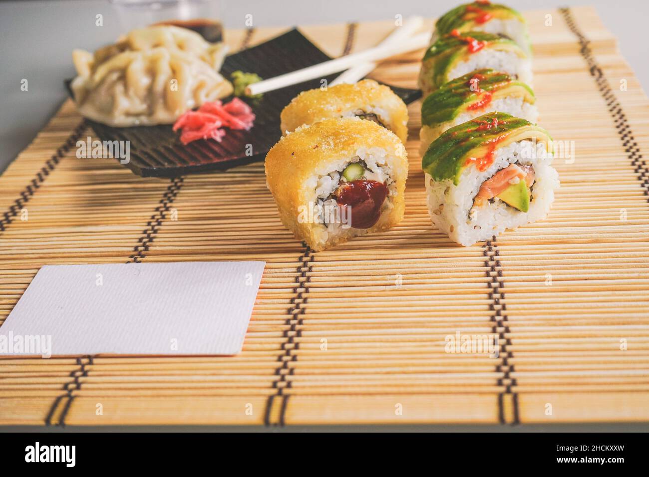 Fushion food of modern california roll and gyoza Stock Photo - Alamy