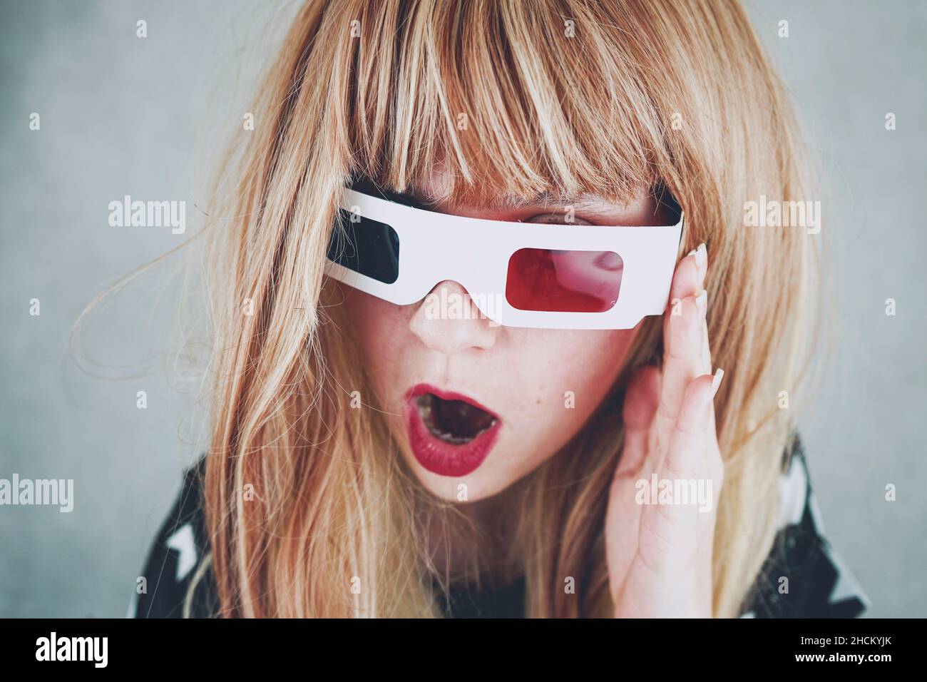 Young woman wearing vintage 3D glasses Stock Photo - Alamy