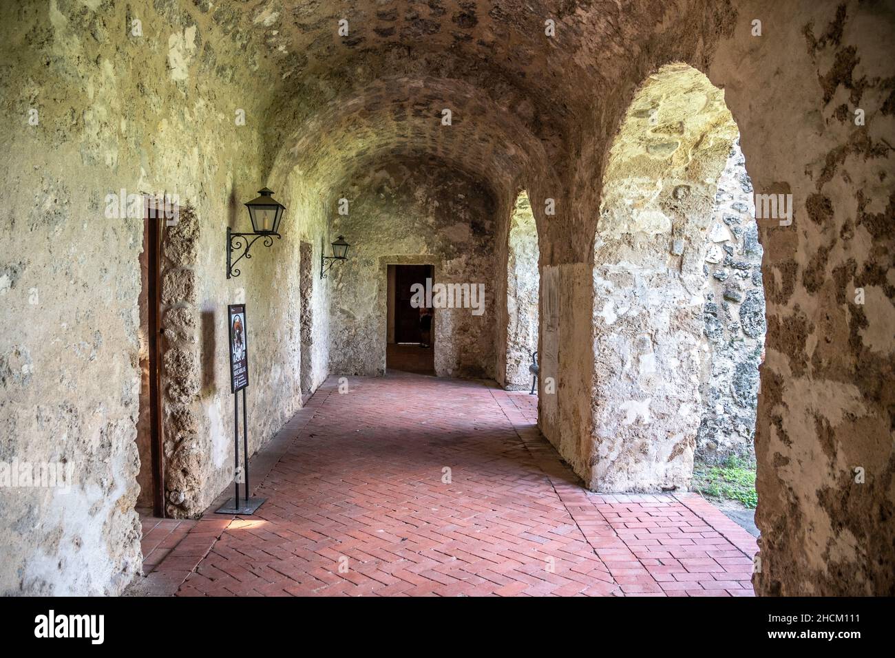 An arched corridor along the exterior of Mission Concepcion Stock Photo ...