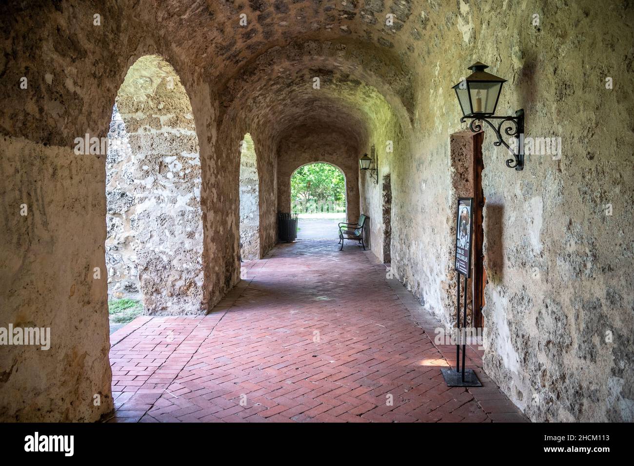 An arched corridor along the exterior of Mission Concepcion Stock Photo ...