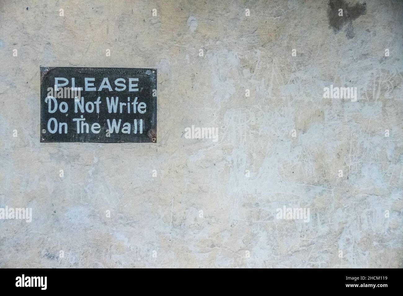 A notice mounted to the wall Stock Photo - Alamy
