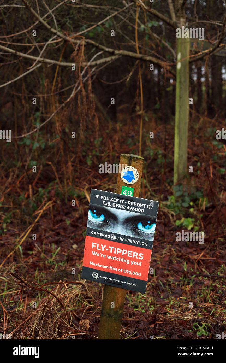 Fly-tipping warning sign in the UK countryside Stock Photo - Alamy