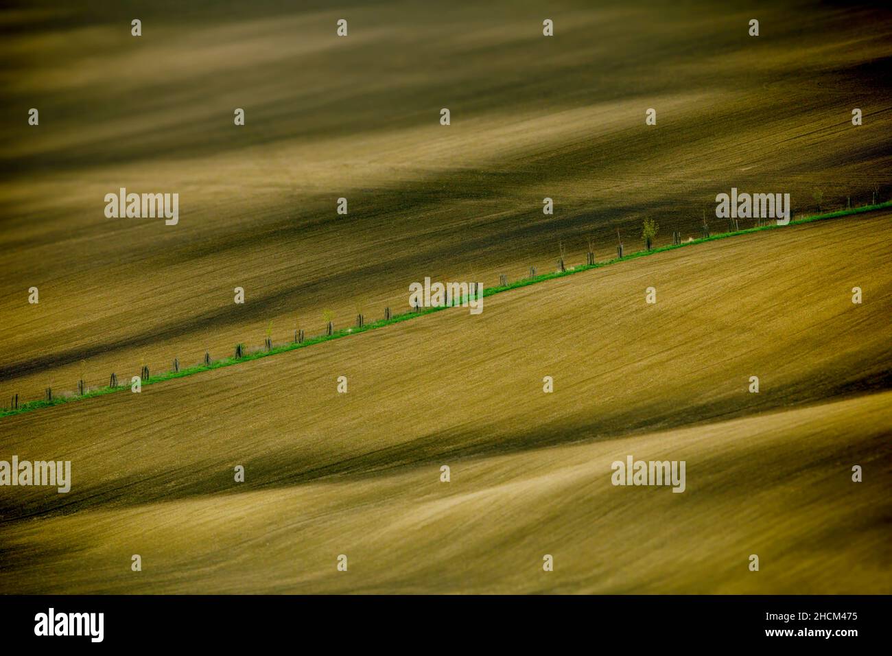 Aerial abstract photo of the rural areas and a narrow road in Moravia ...