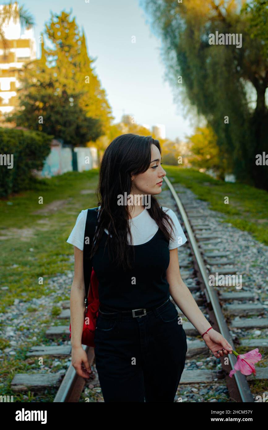 Beautiful girl on train tracks hi-res stock photography and images - Alamy