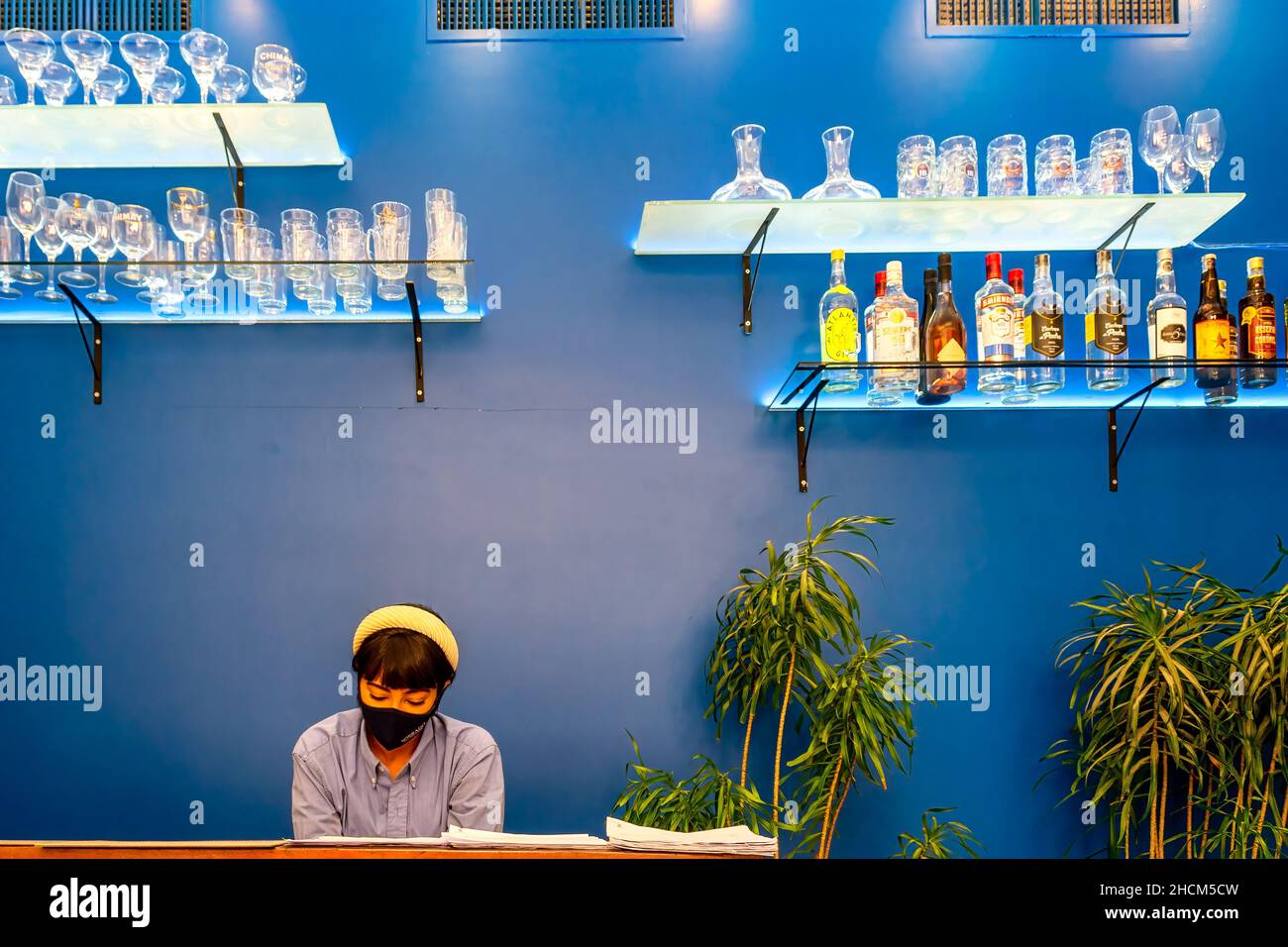 Female bartender working in the restaurant Sobrado da Cidade. Interior ...