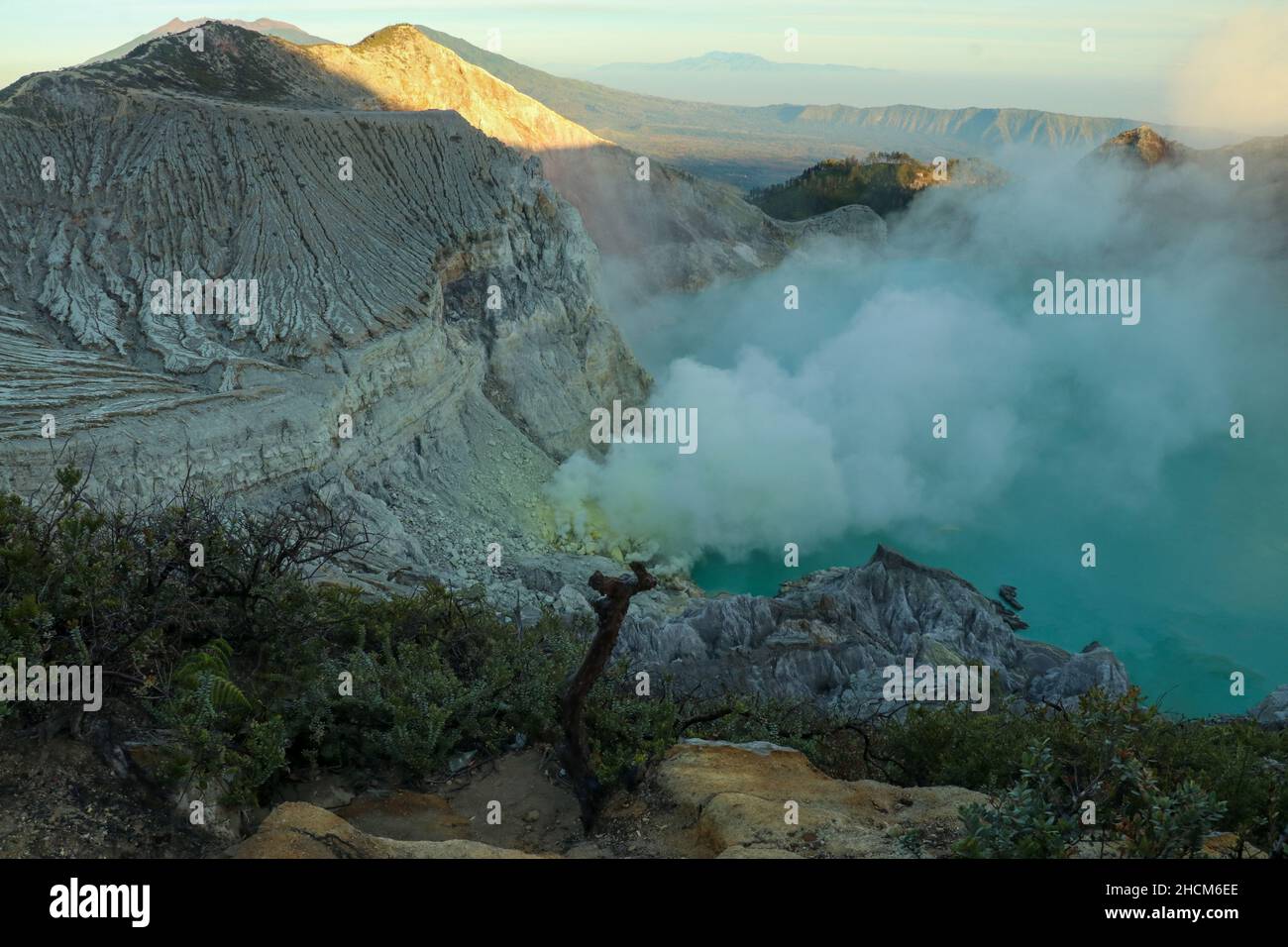 Beautiful Landscape mountain and green lake in the morning at Kawah Ijen volcano , East Java ...