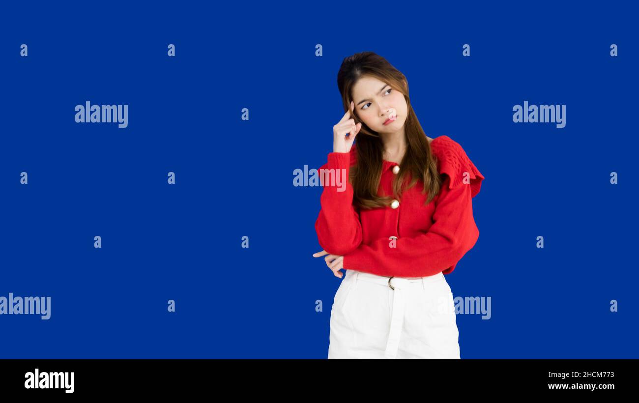 Portrait of an Asian female with a concerned expression on her face on ...