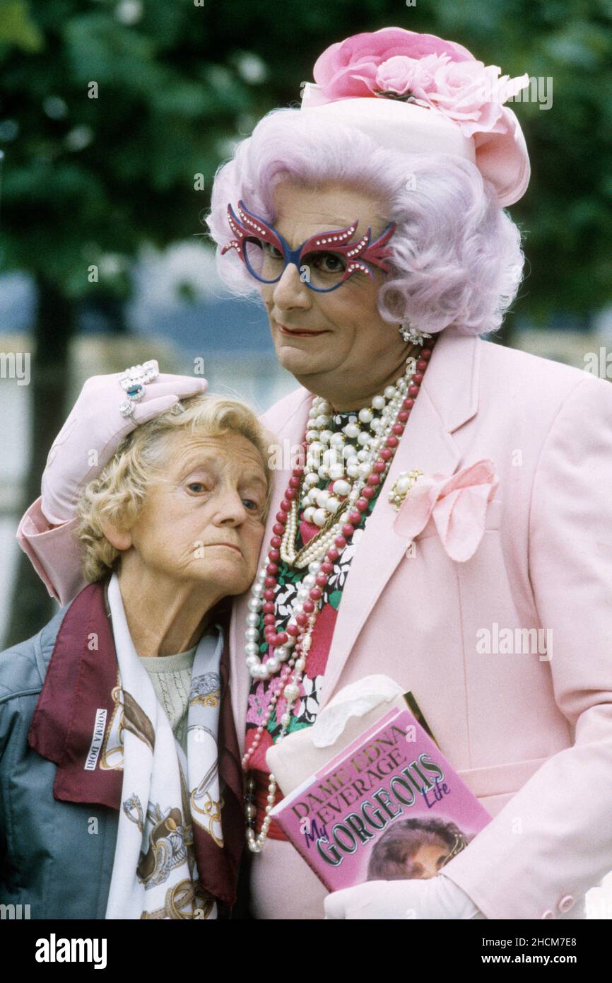 Australian comedy actor Barry Humphries as Dame Edna Everage with Emily ...