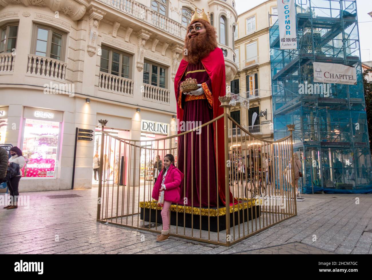 Young girl in front of giant statue of Saint Melchior during Three ...