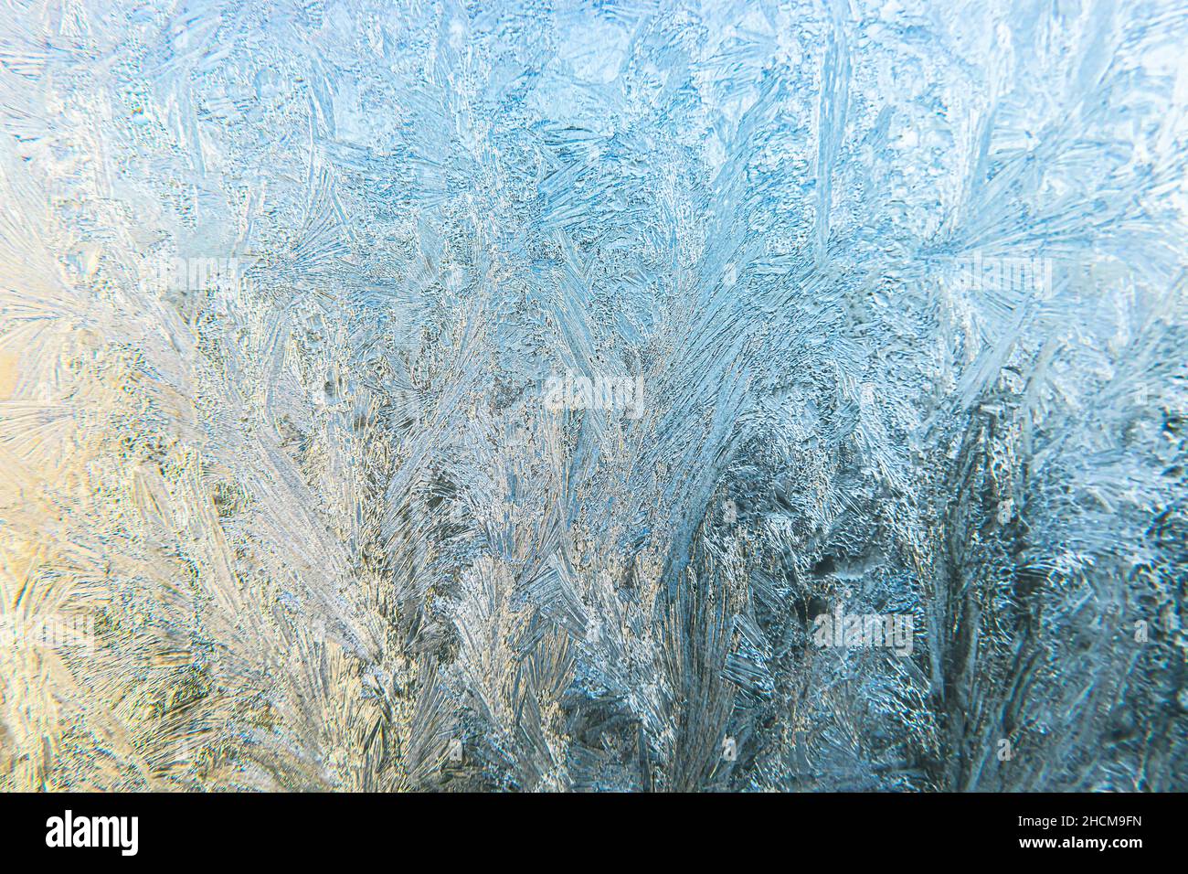 Frozen winter window with shiny ice frost pattern texture. Christmas ...