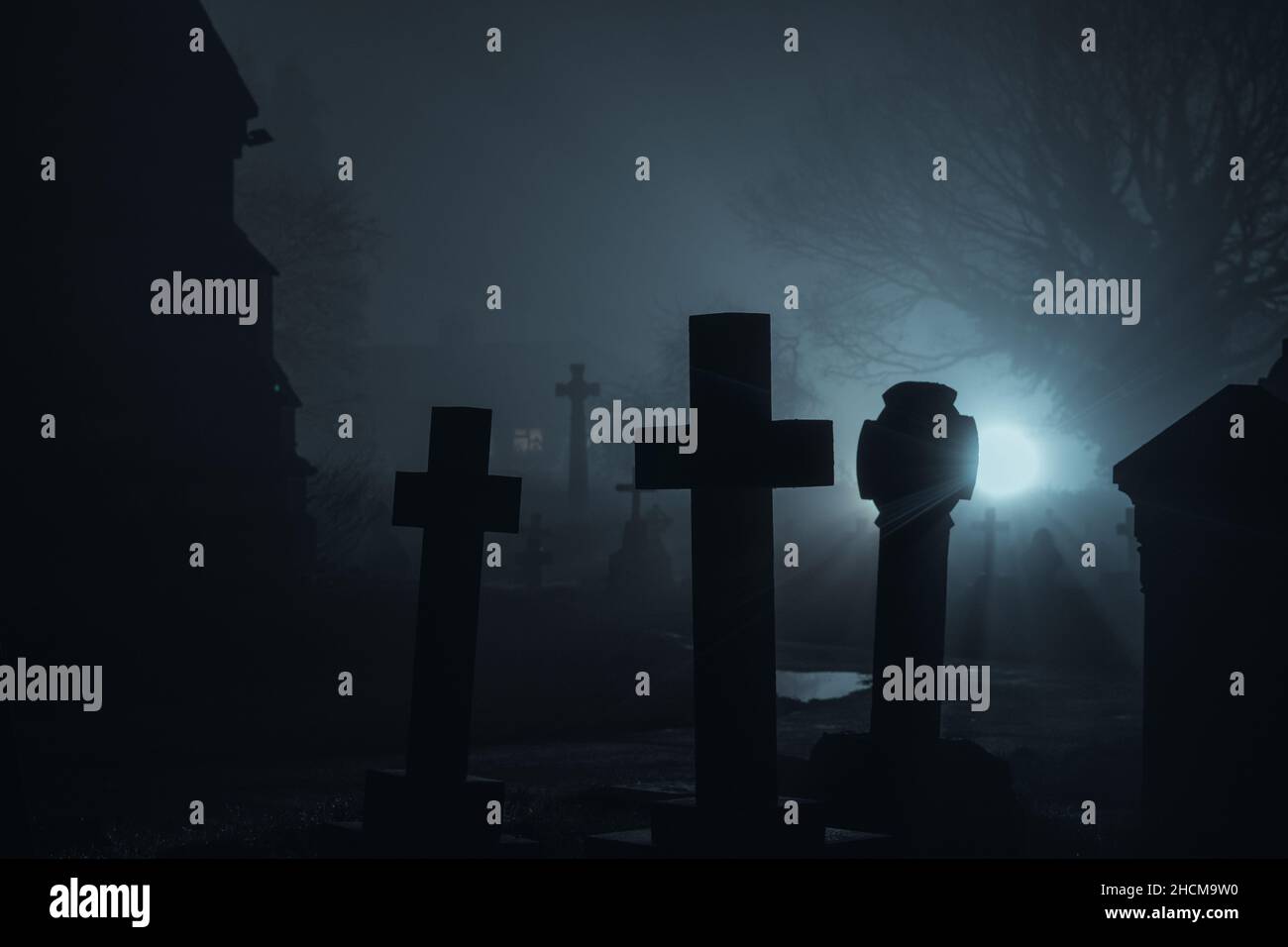 Spooky halloween night foggy cemetery hi-res stock photography and ...