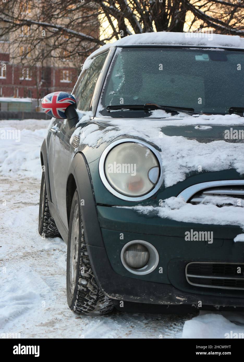 car is covered with a layer of white snow winter has come to Great ...