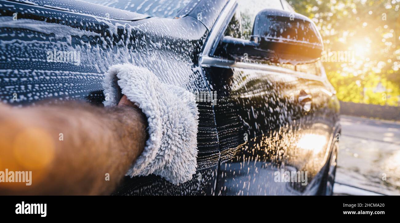 Black man pressure washing hi-res stock photography and images - Alamy