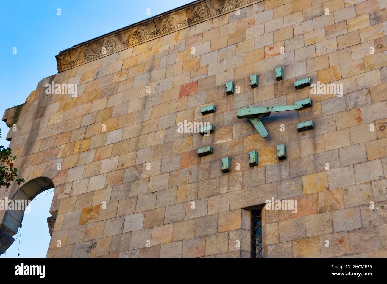 Old historical clock in Skopje during the earthquake Stock Photo - Alamy