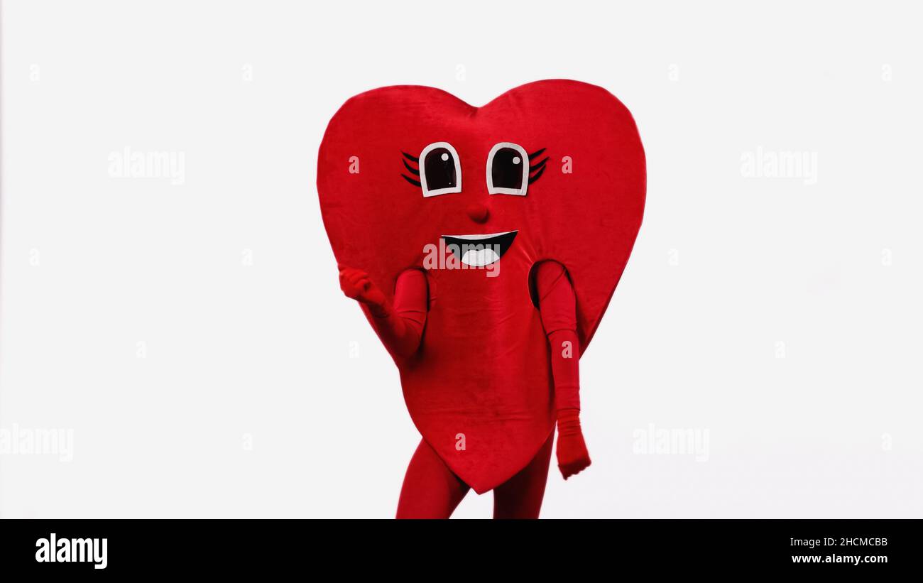 person in happy red heart costume dancing isolated on white Stock Photo ...