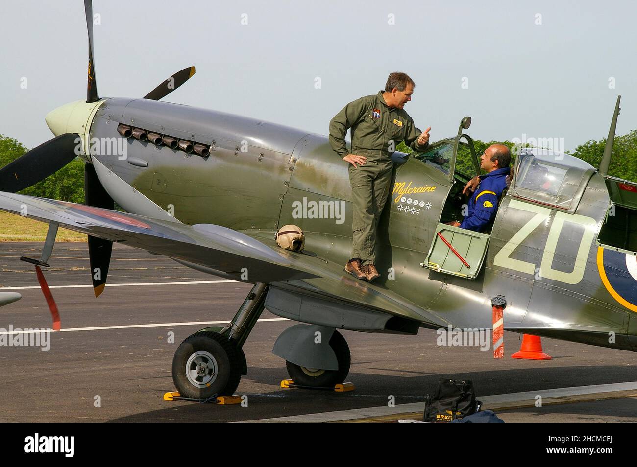 Pilot Nigel Lamb allowing another pilot to sit in Second World War ...