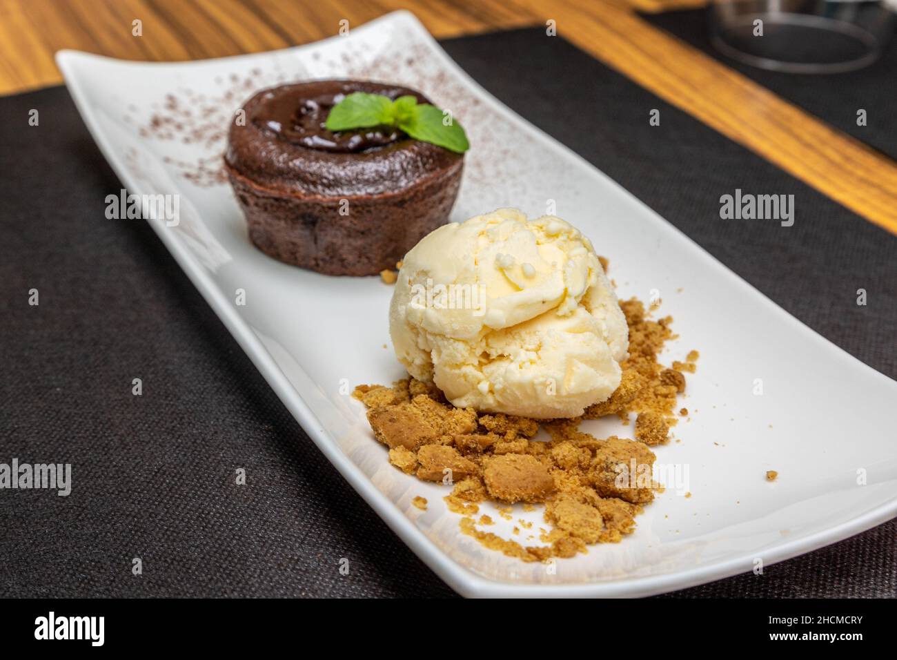 Closeup shot of chocolate fondant with vanilla ice-cream Stock Photo ...