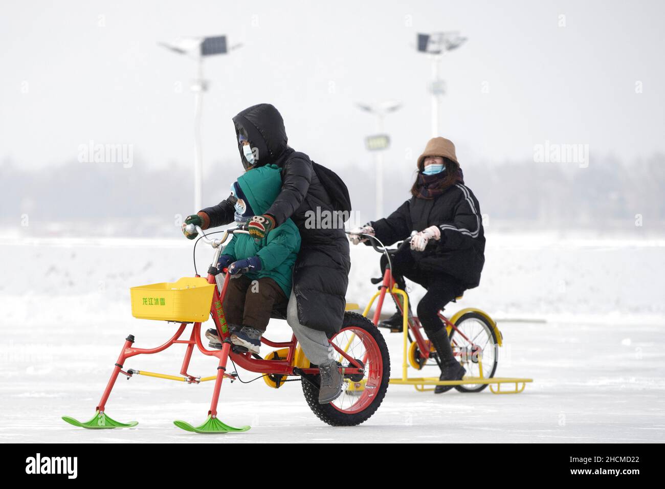 Harbin, China's Heilongjiang Province. 30th Dec, 2021. Tourists have ...