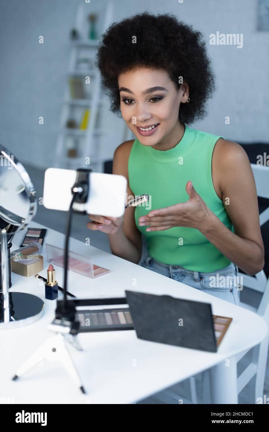 African american blogger holding hi-res stock photography and images ...