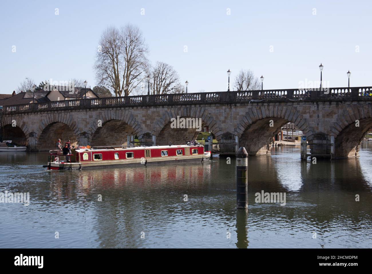 A narrowboat passing underneath Maidenhead Bridge in Berkshire in the ...