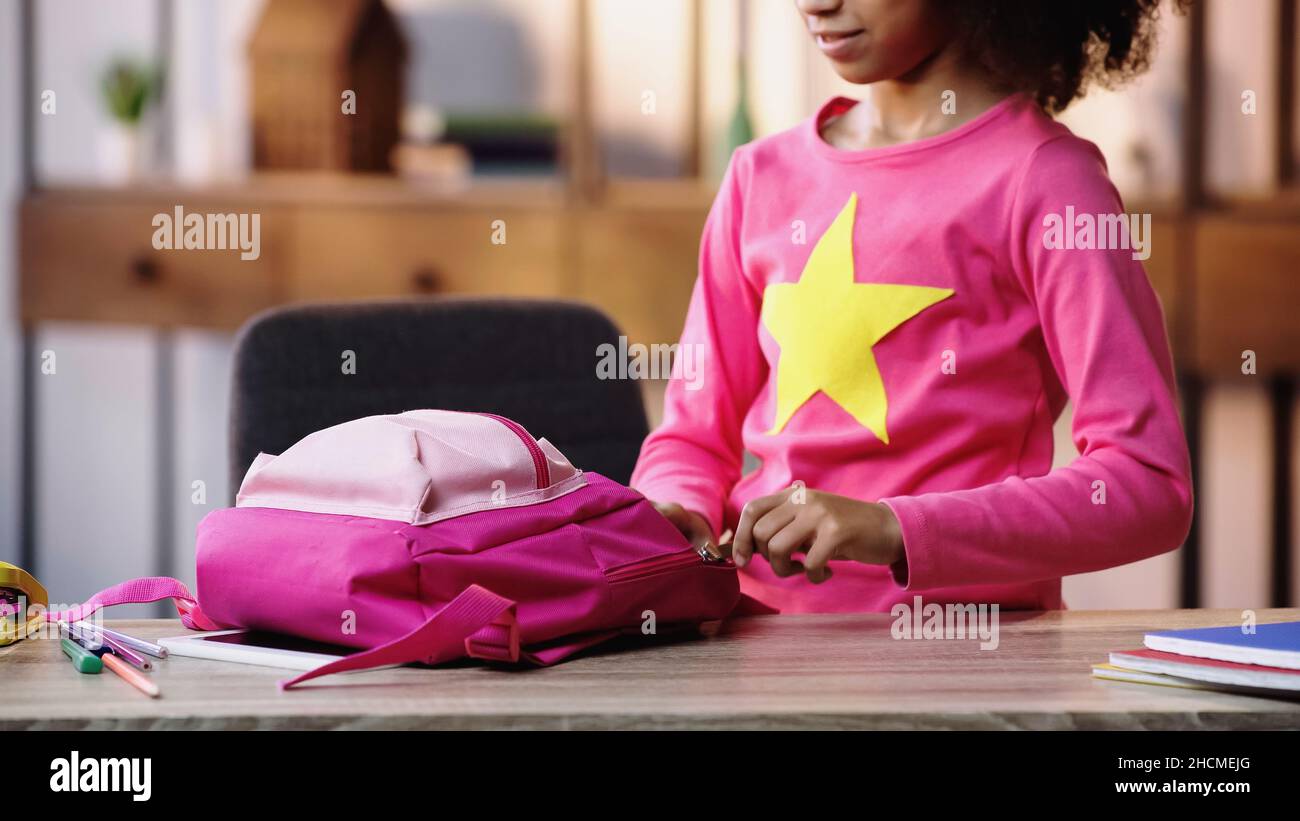 Child backpack packing hi-res stock photography and images - Alamy