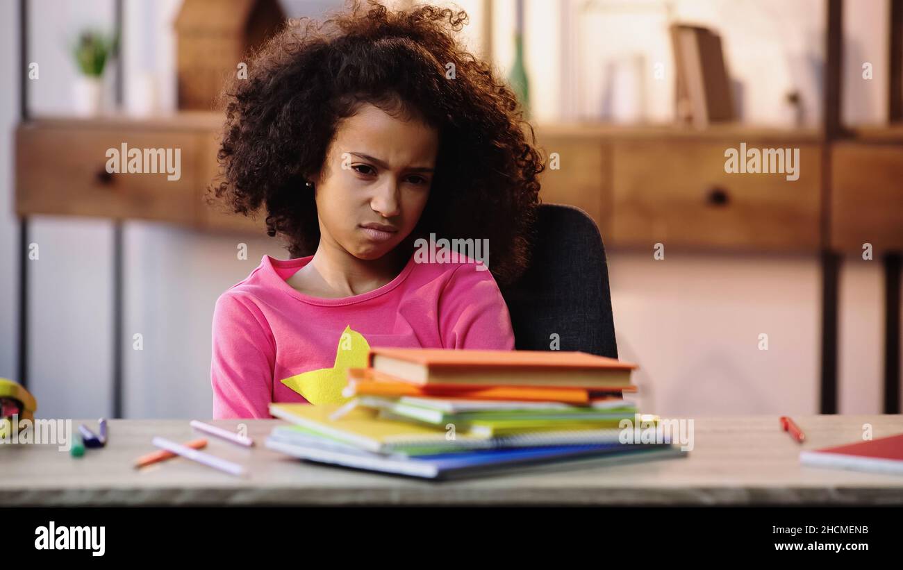 Sad girl homework hi-res stock photography and images - Alamy