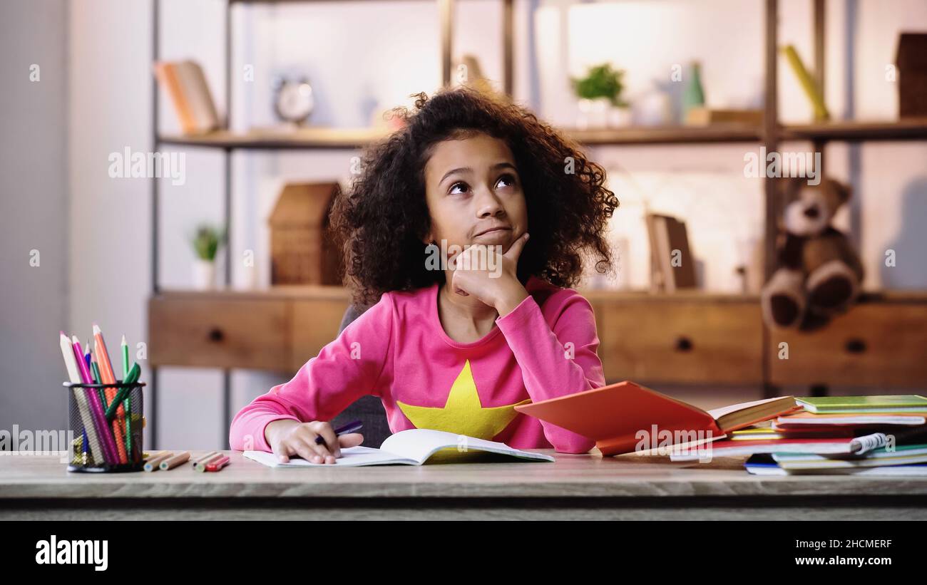 African american schoolgirl table hi-res stock photography and images ...