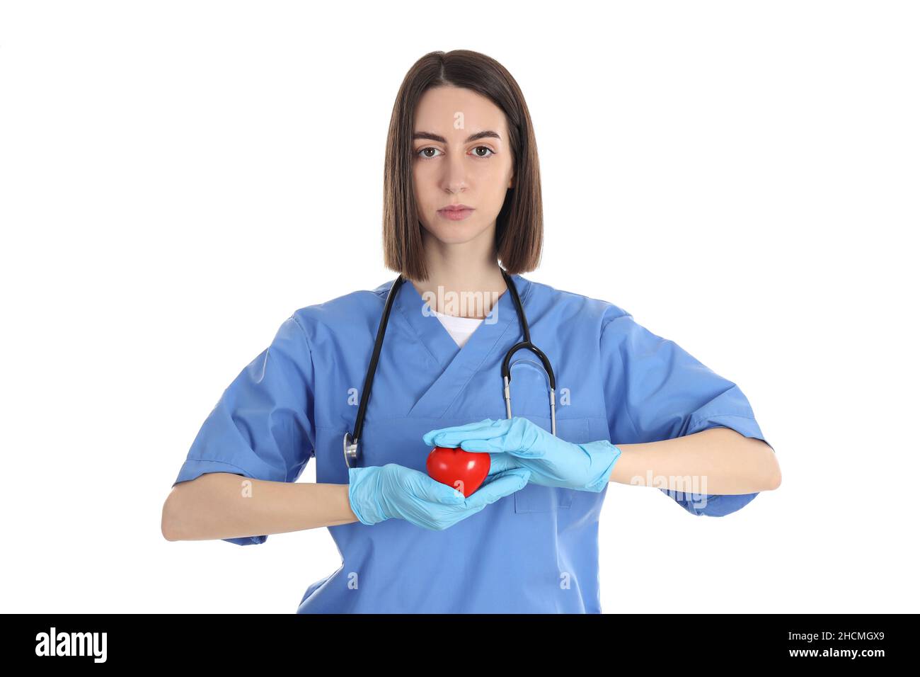 Female nurse with heart isolated on white background Stock Photo - Alamy