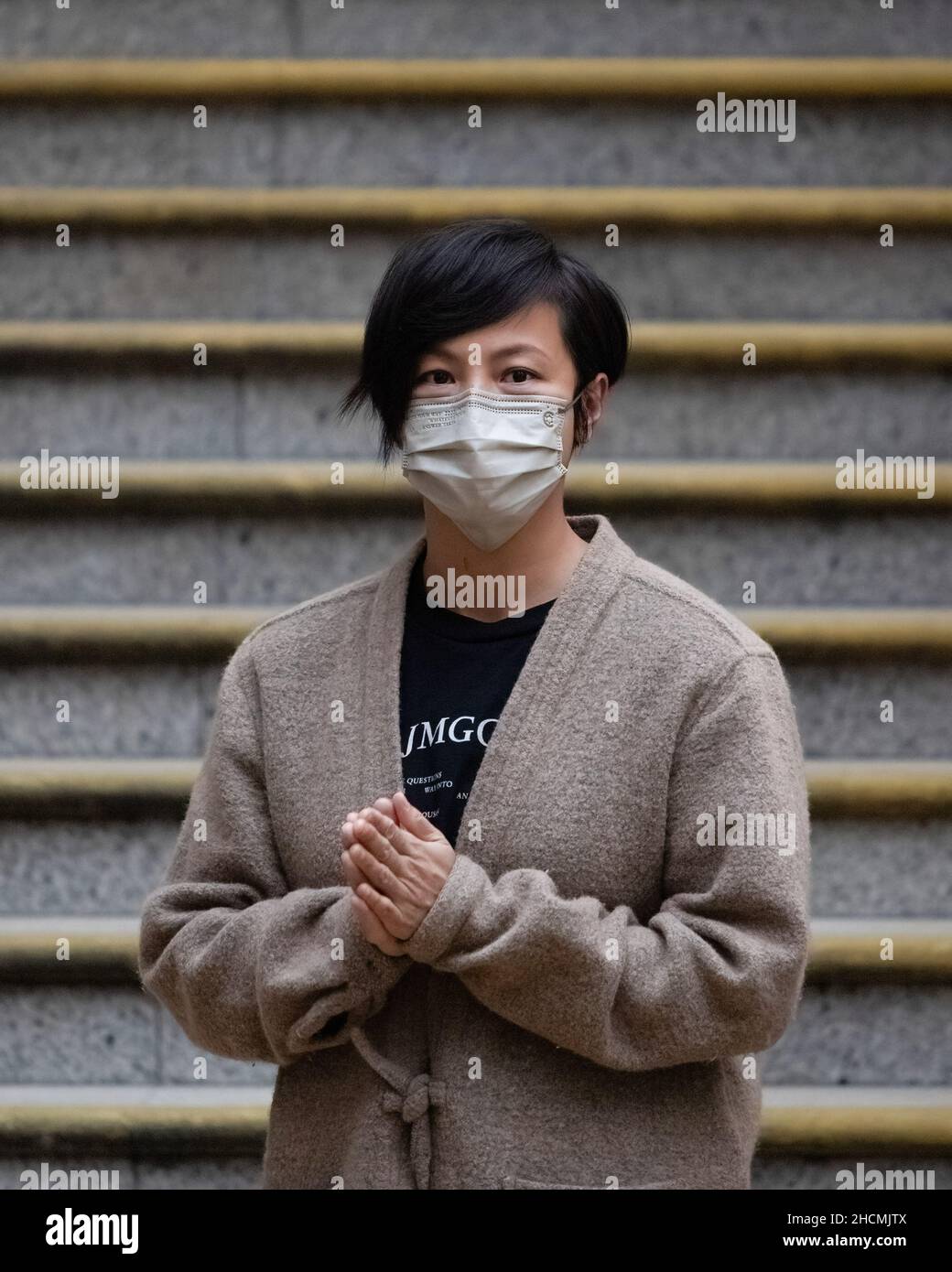 Denise Ho poses for a photo after being granted a bail at the police ...