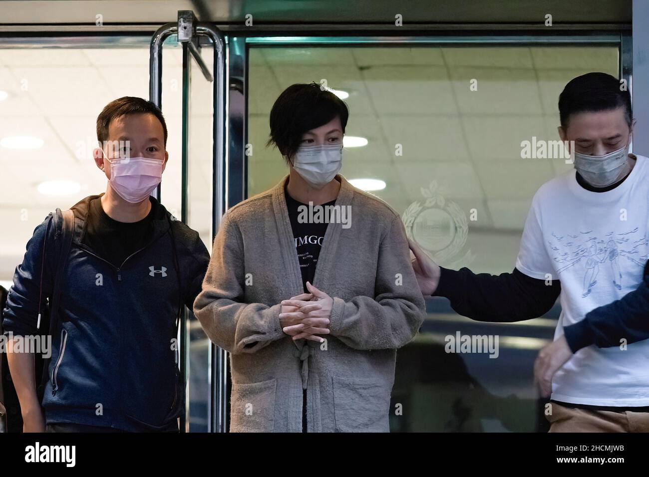 Denise Ho walks out of the police station along with singer Wong Yiu ...