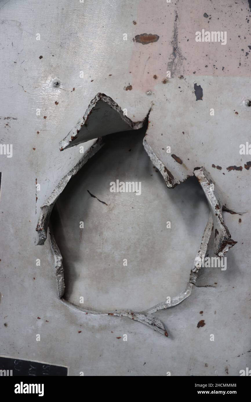 Shell Hole in Armour Plate from a warship Stock Photo - Alamy
