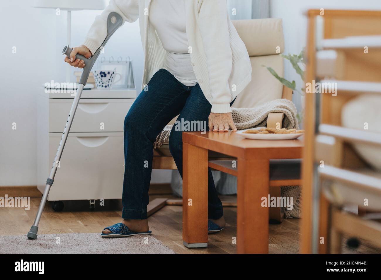 Old lady with a cane hi-res stock photography and images - Alamy