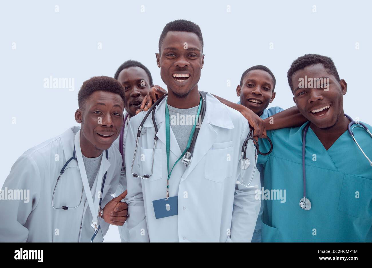in full growth. smiling young doctors standing one by one Stock Photo ...