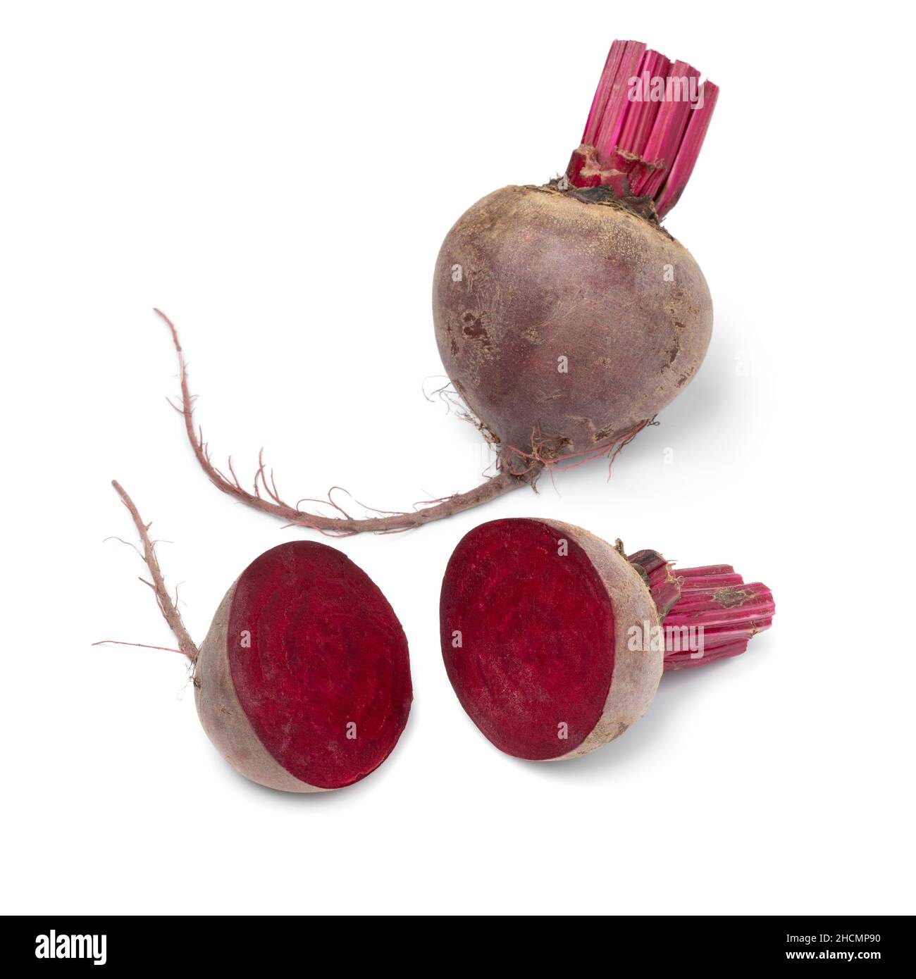 Fresh whole and halved raw red beets isolated on white background Stock ...