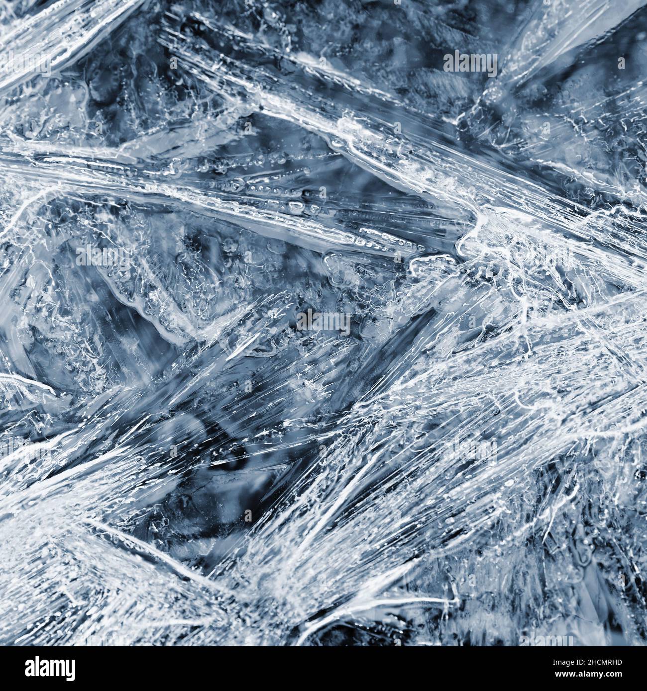 Frozen pool of water in winter. Ice nature - macro shot of frozen water ...