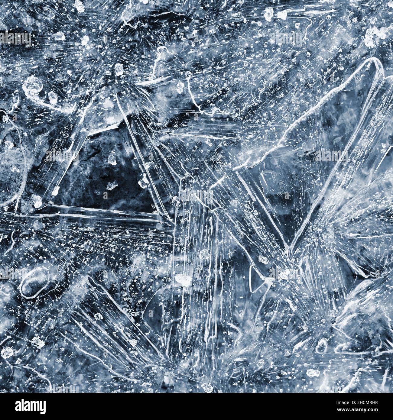 Frozen pool of water in winter. Ice nature - macro shot of frozen water ...