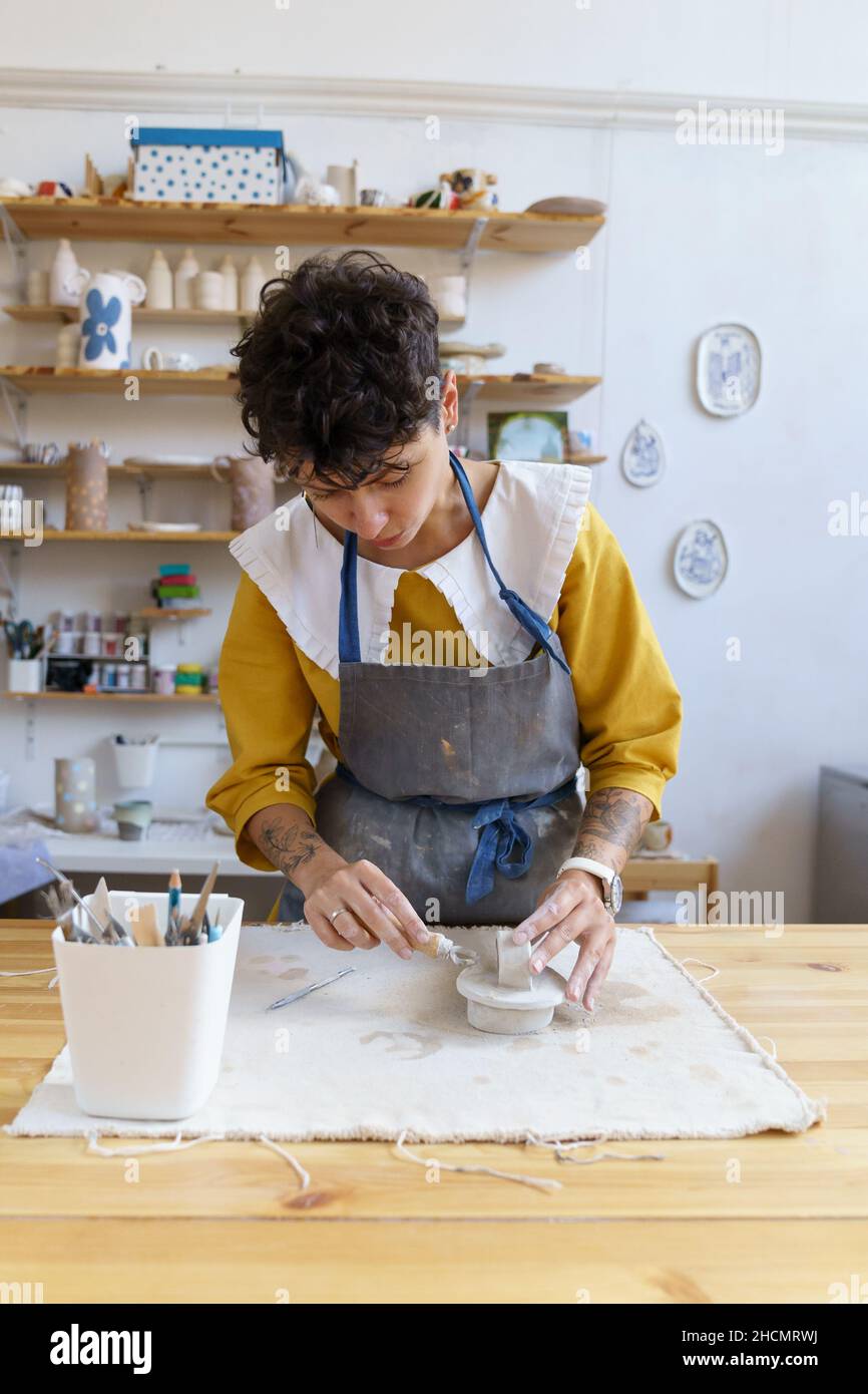 Handmade business. Young female artist creating unique handcrafted ...