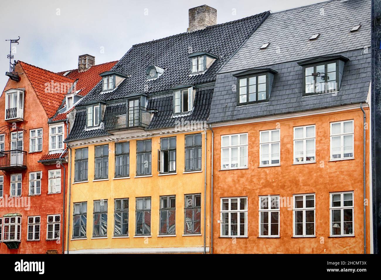 COPENHAGEN, DENMARK - Colorful houses parade at Nyhavn harbor famous ...