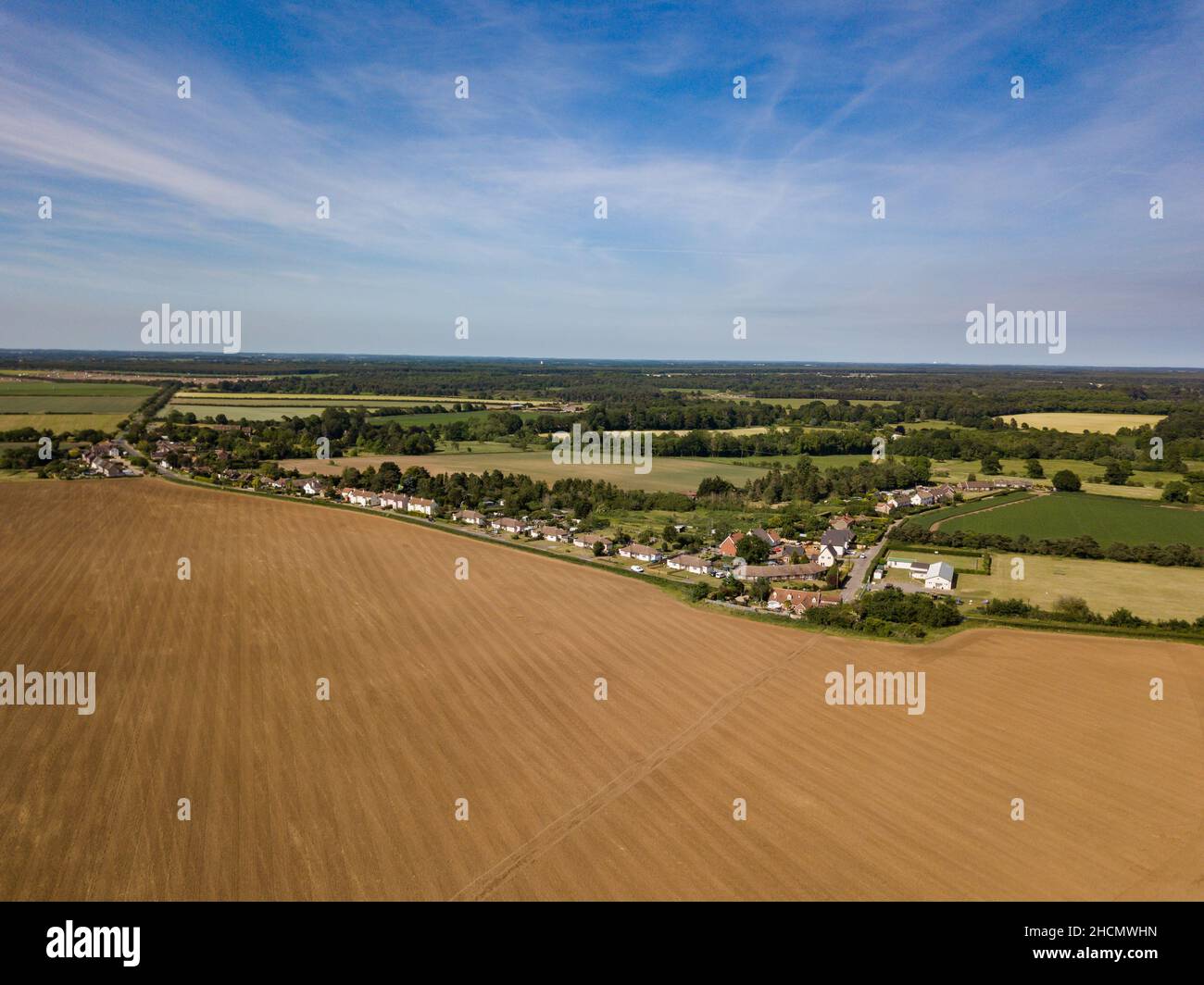 An aerial view of the small countryside village of Sutton in Suffolk ...