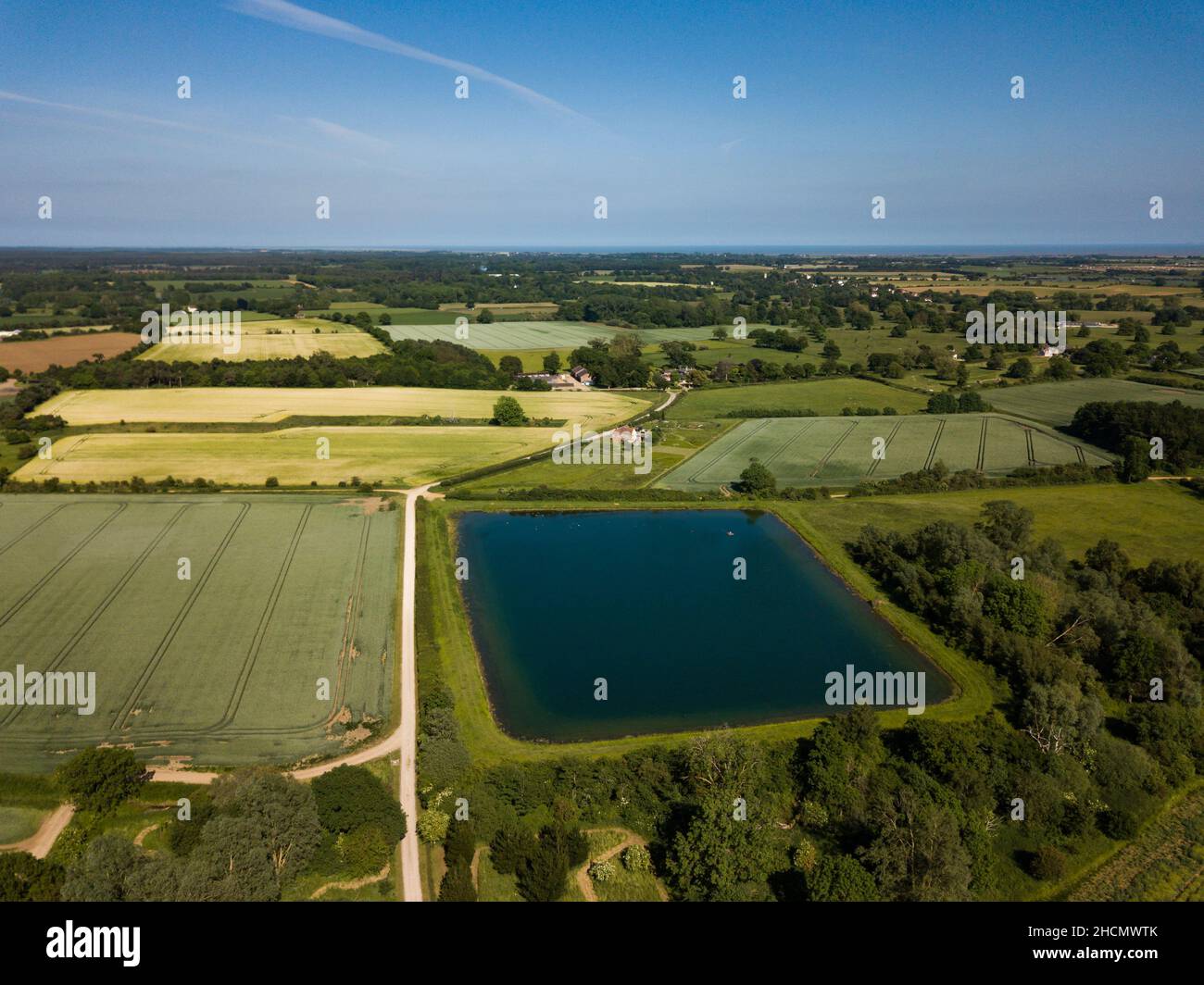 Aerial view of a patchwork of farm fields in the Suffolk countryside ...