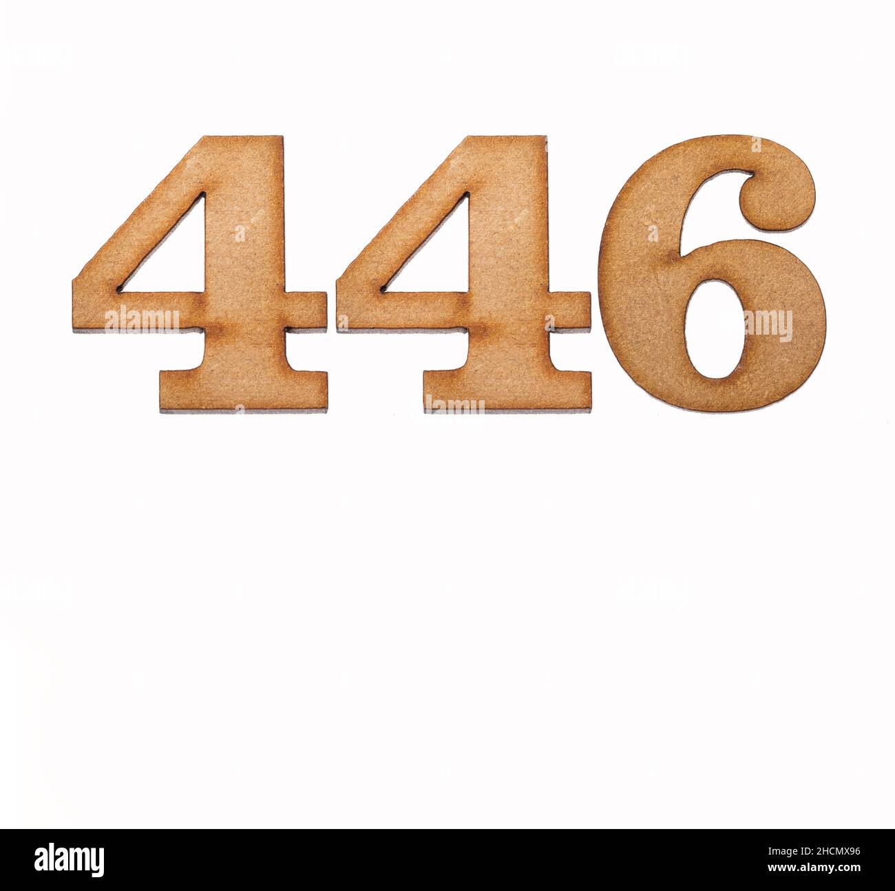 Number 446 in wood, isolated on white background Stock Photo - Alamy