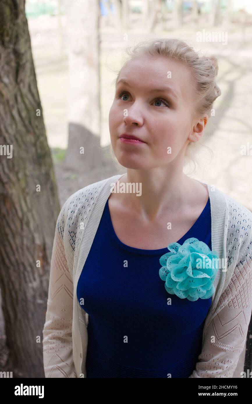 Young Pretty Blonde Girl Enjoing Spring Nature In Park Lifestyle