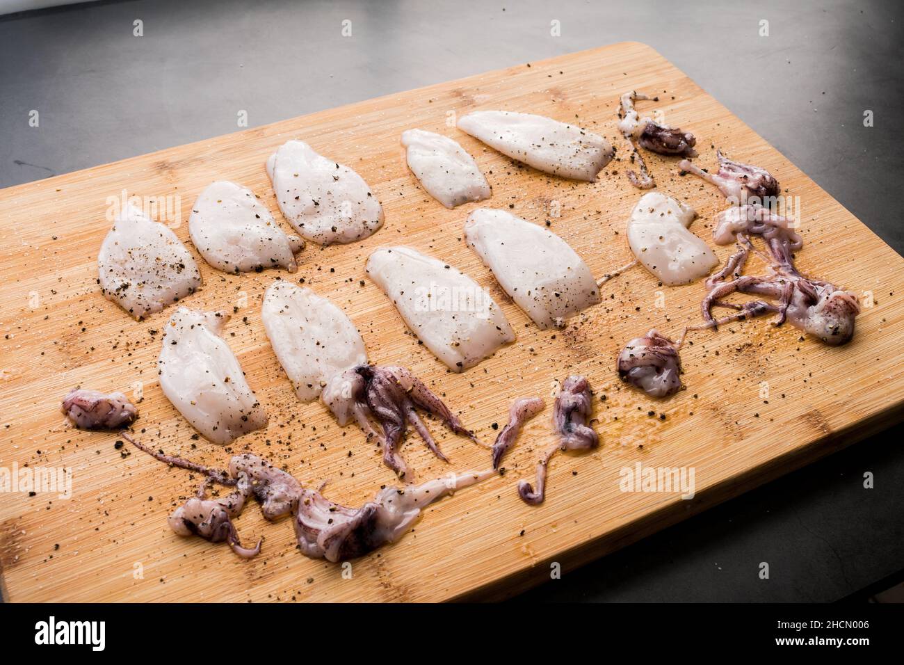 Raw Squid Tubes and Tentacles Seasoned with Salt and Pepper: Uncooked ...