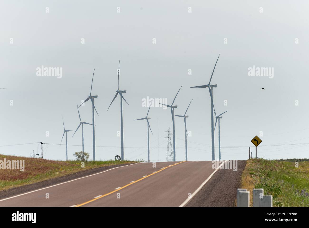 Empty road and wind turbine hi-res stock photography and images - Alamy