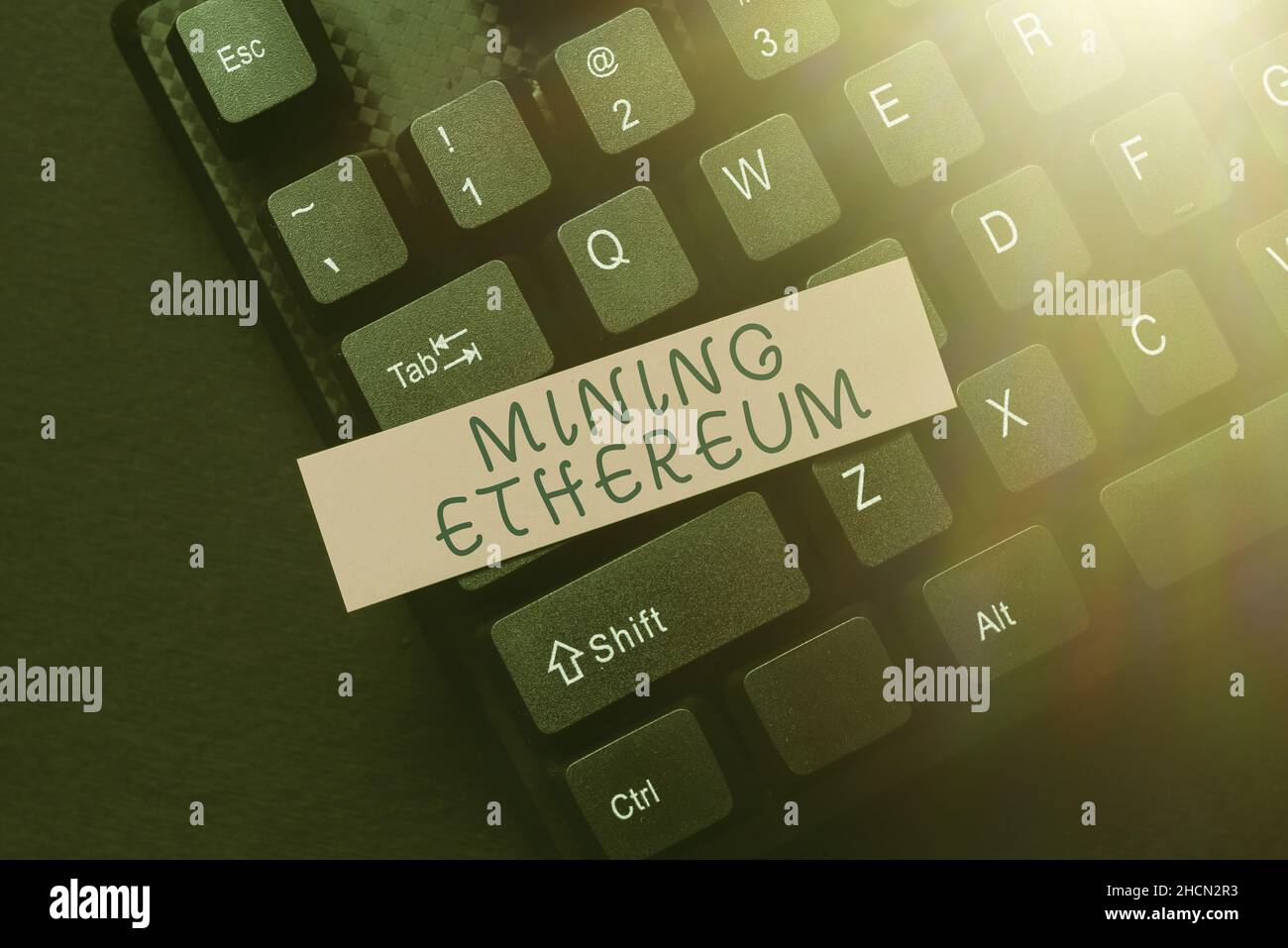 Hand writing sign Mining Ethereum. Business showcase the process of ...