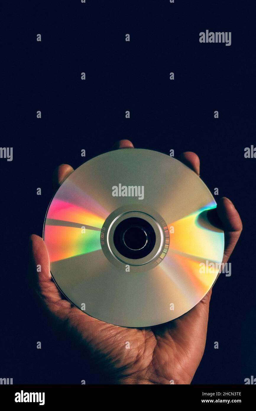 Hand holding cd hi-res stock photography and images - Alamy